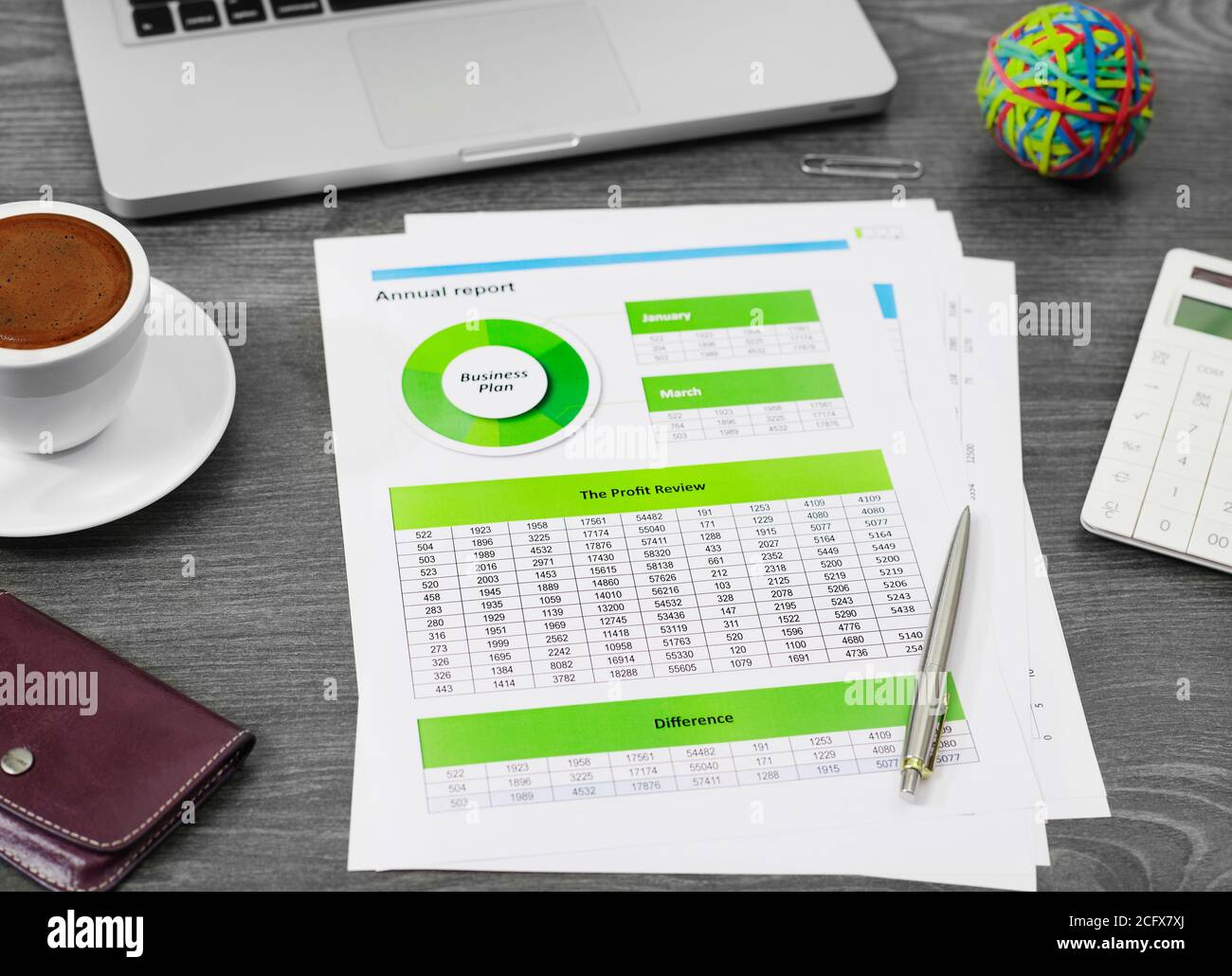 Office desk with financial papers Stock Photo - Alamy