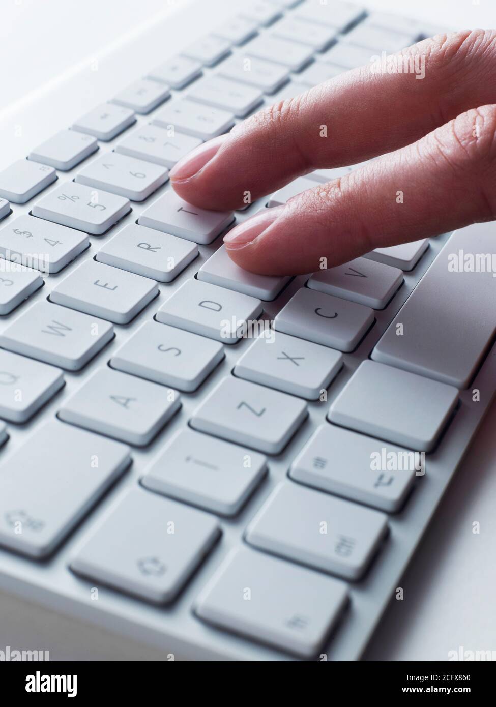 Fingers on keyboard Stock Photo - Alamy