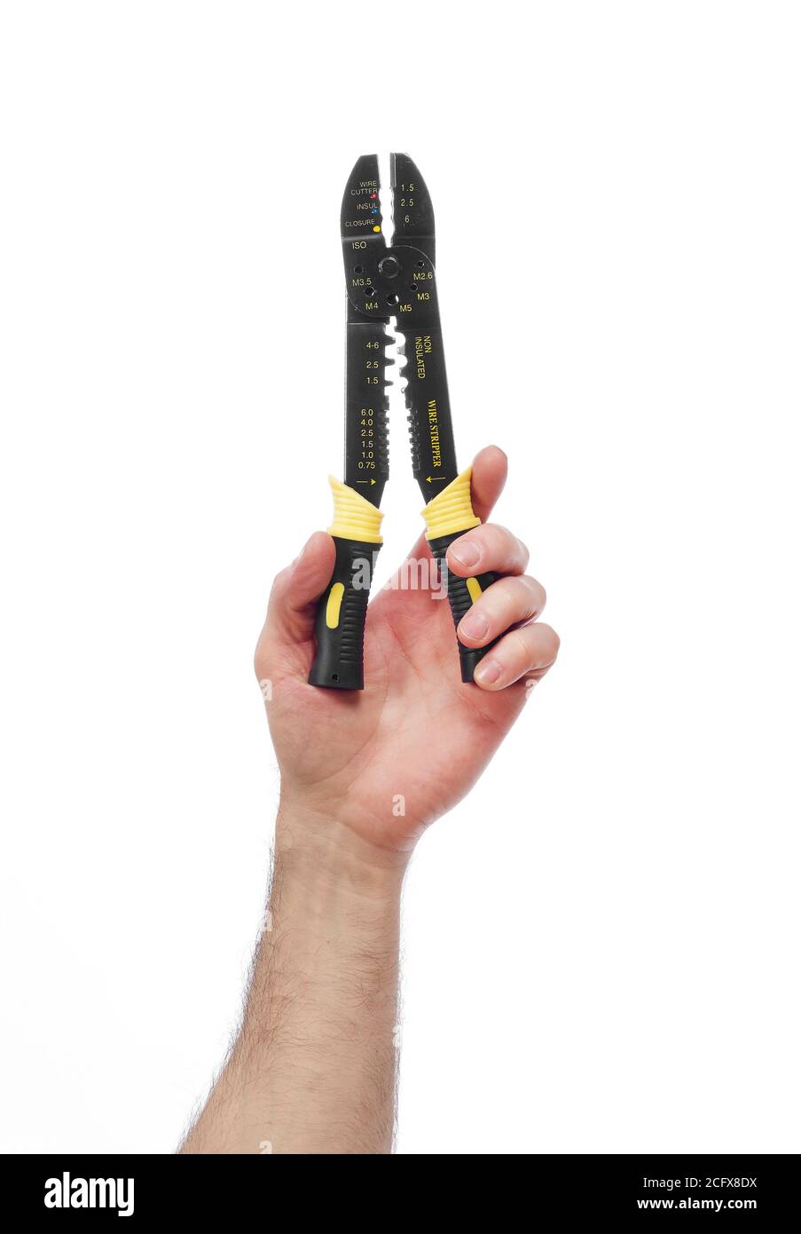 Hand with wire stripper Stock Photo - Alamy