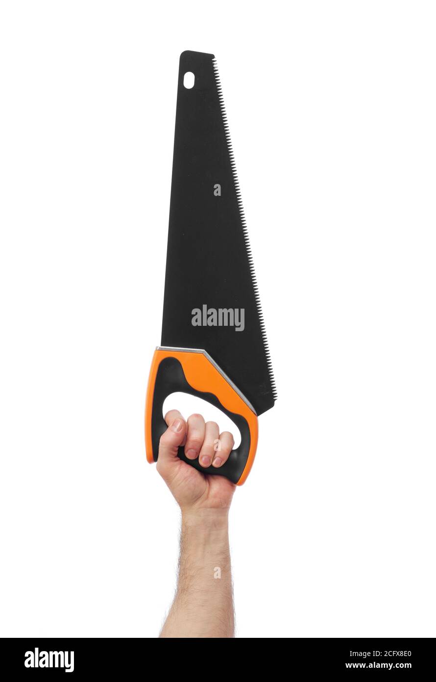 Hand with saw Stock Photo - Alamy