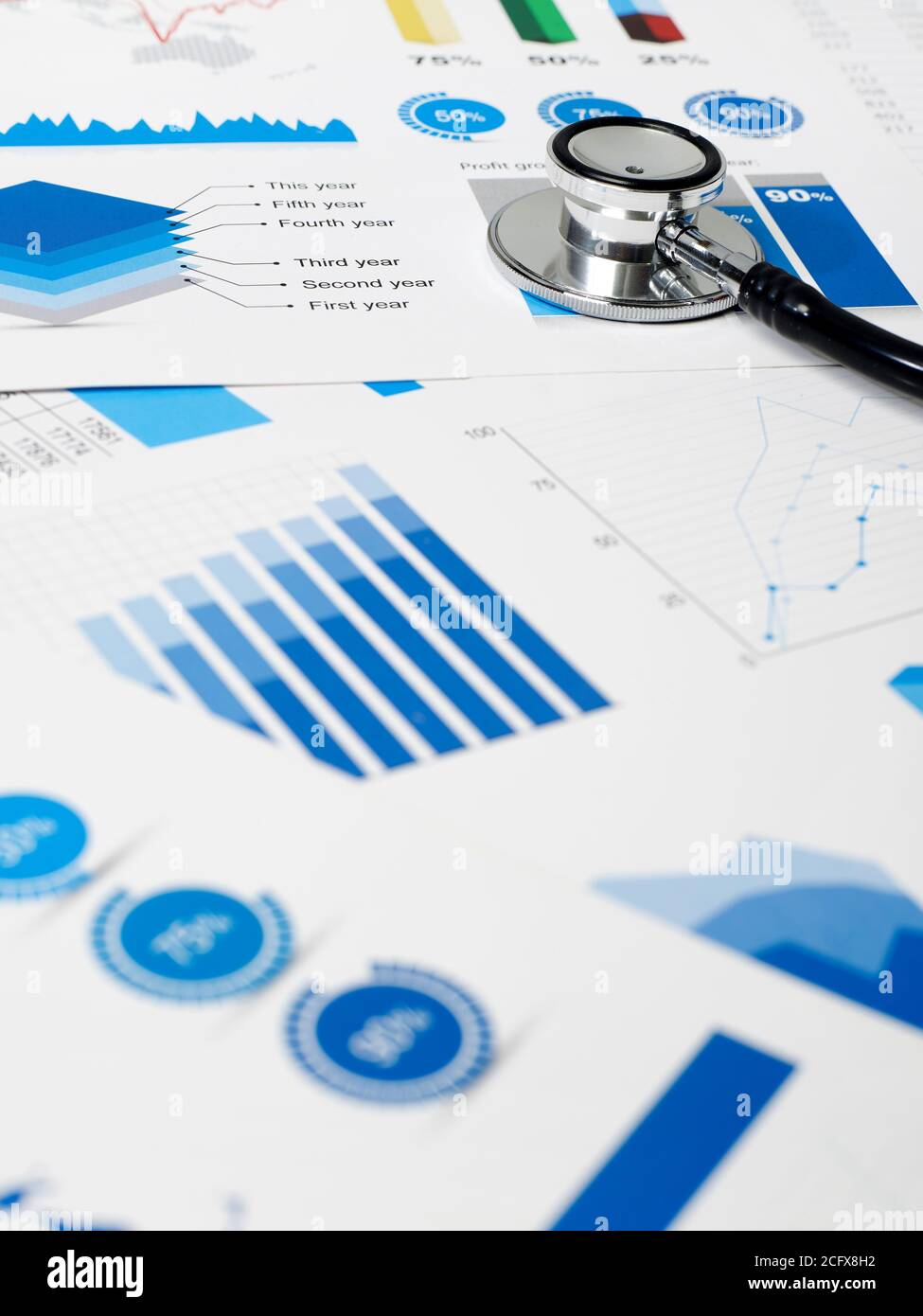 Stethoscope on chart papers Stock Photo - Alamy