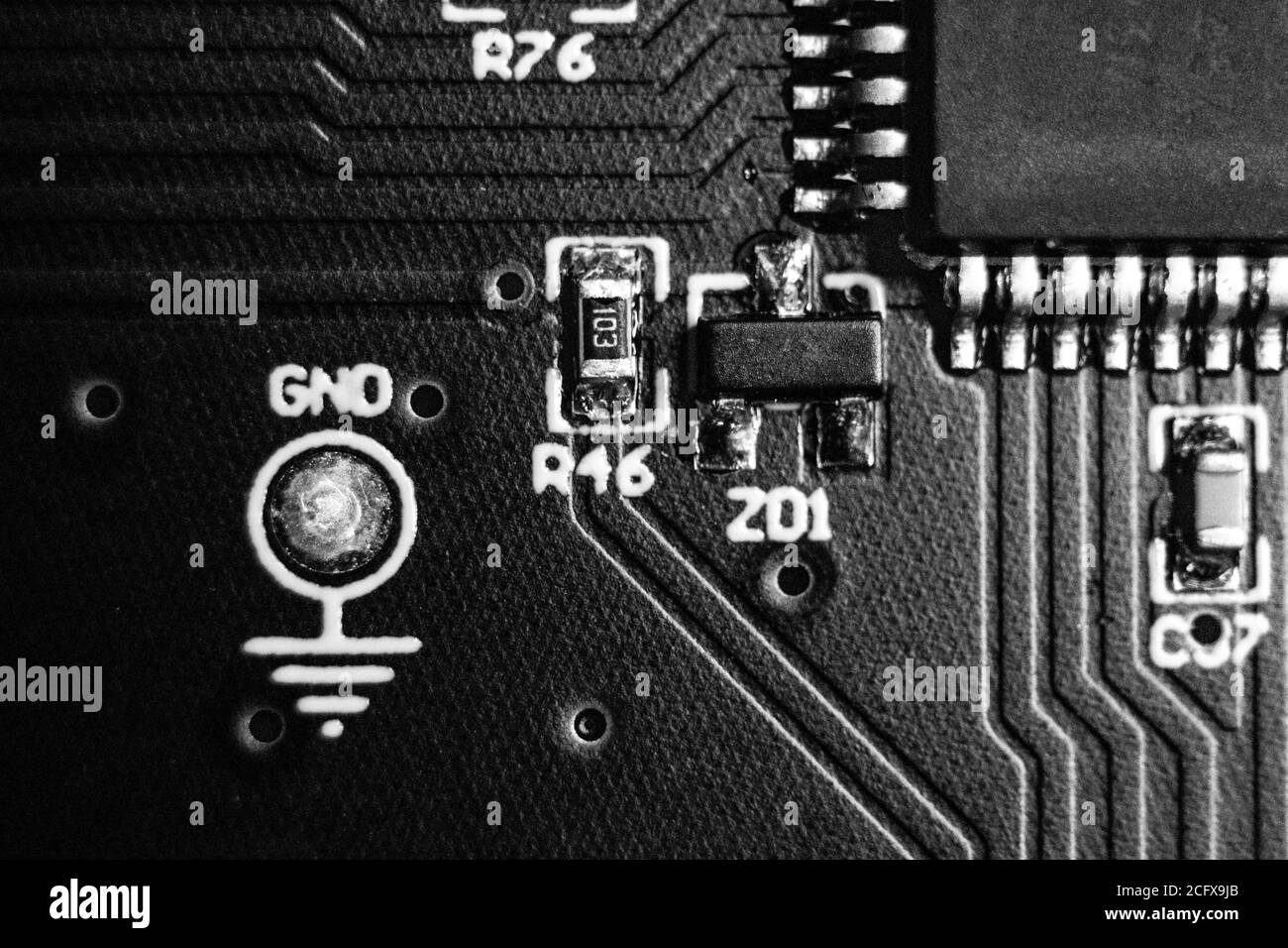 black and white close up for ground test point next to microcontroller ...