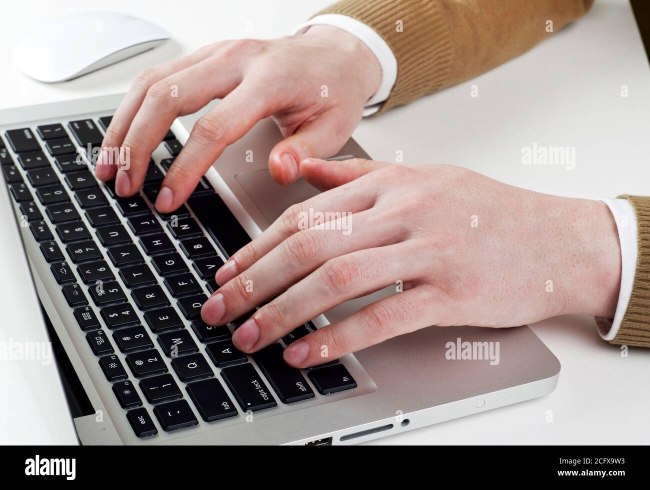 Hands on laptop Stock Photo - Alamy