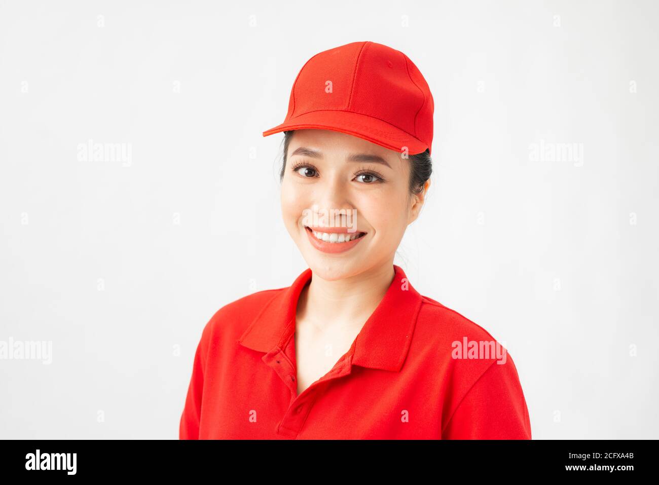 Portrait Of happy Female staff in uniforms isolated on white background ...