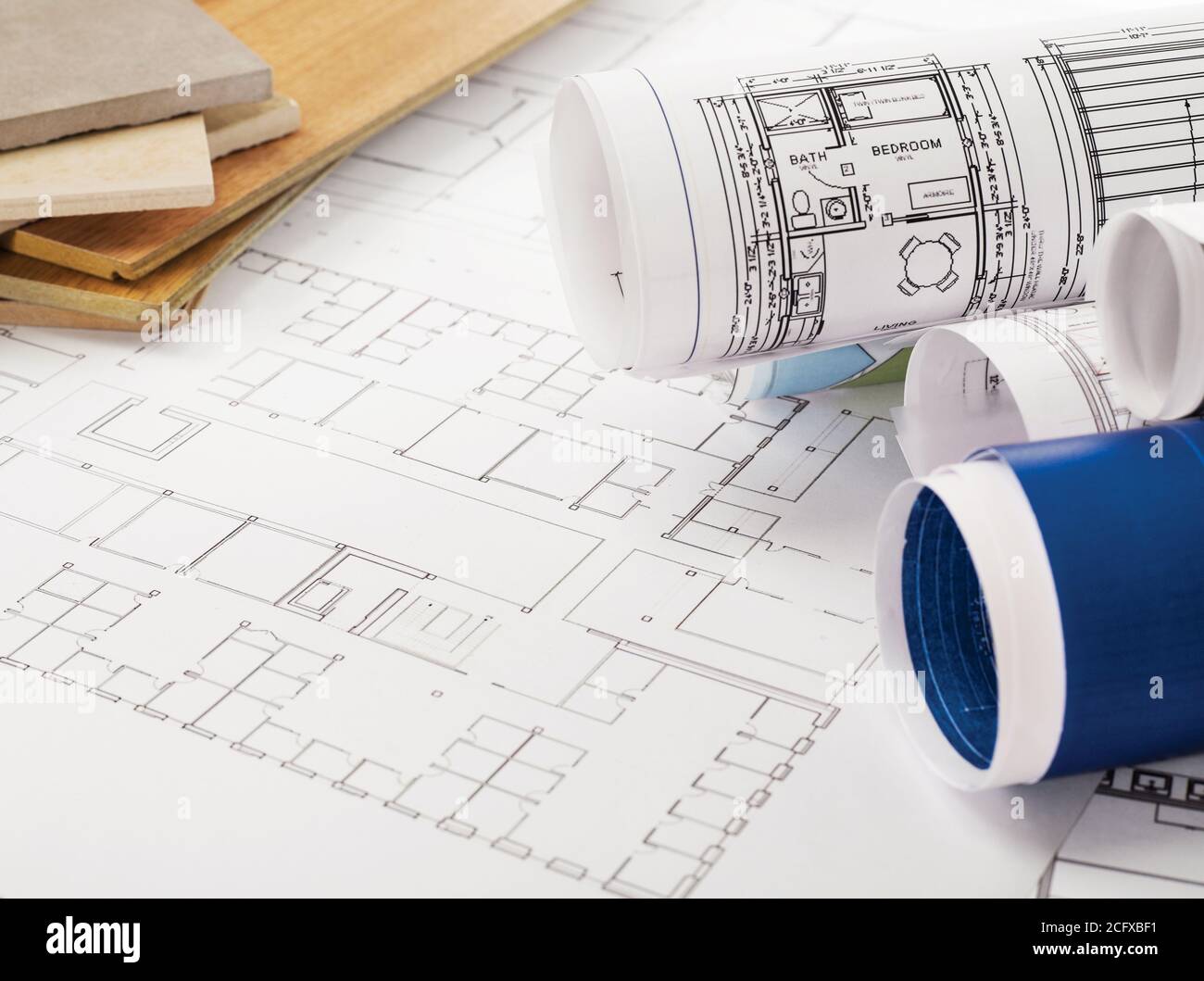 Blueprints, wood and stone samples Stock Photo - Alamy