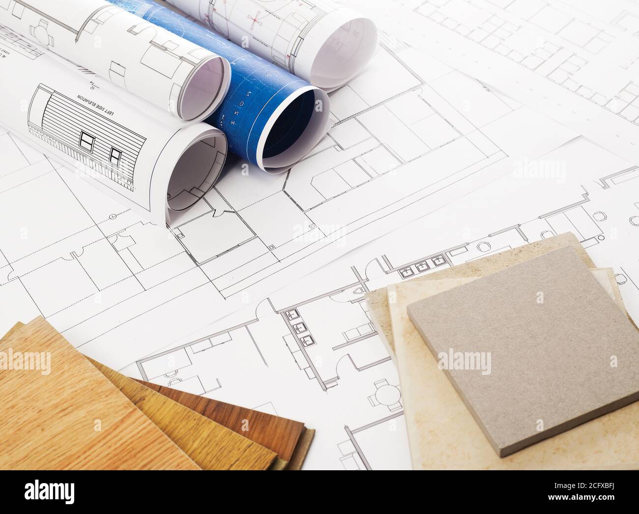 Blueprints, wood and stone samples Stock Photo - Alamy