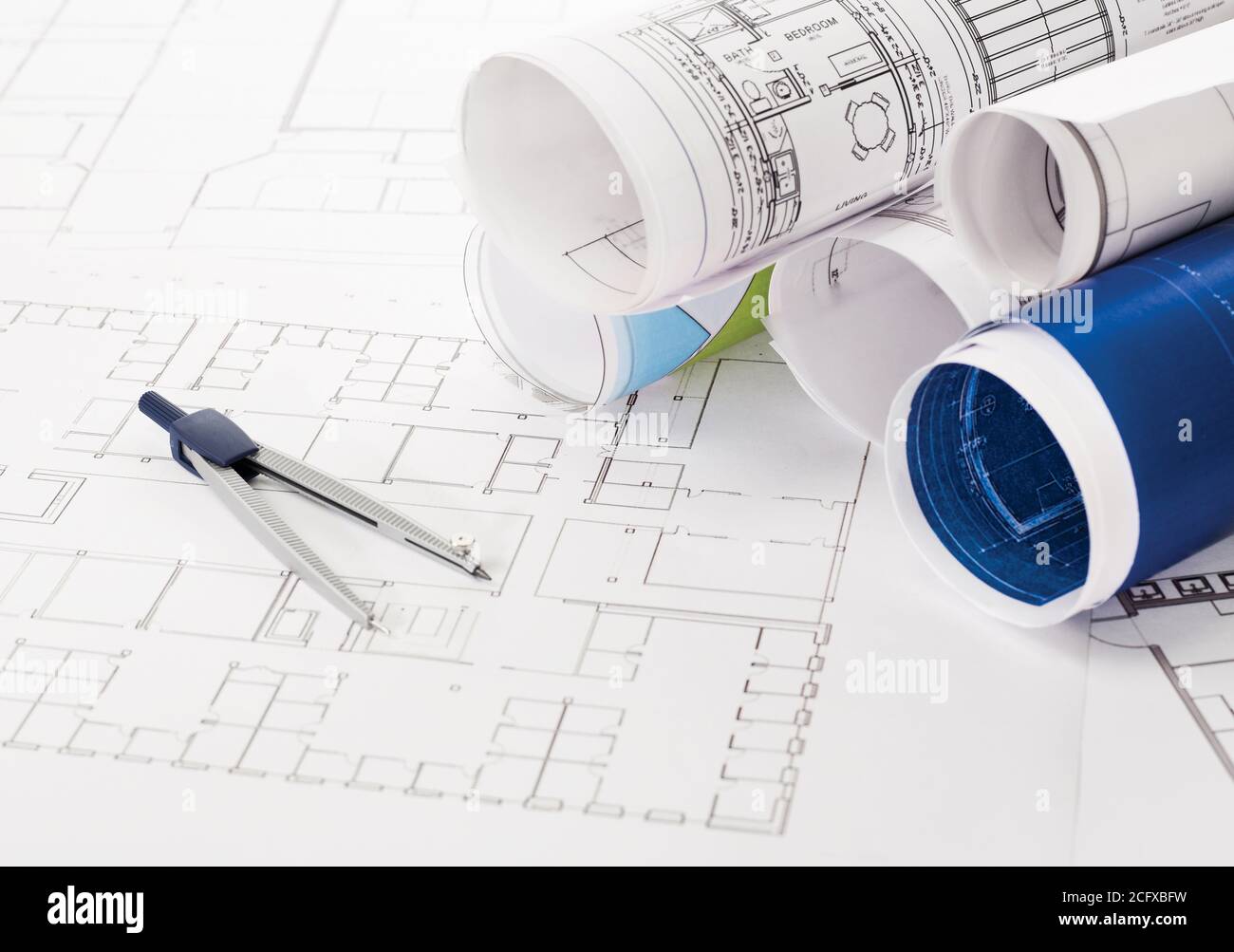Blueprints and compass Stock Photo - Alamy