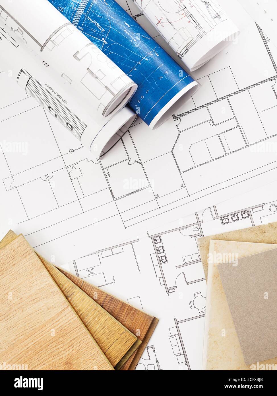 Blueprints, wood and stone samples Stock Photo - Alamy