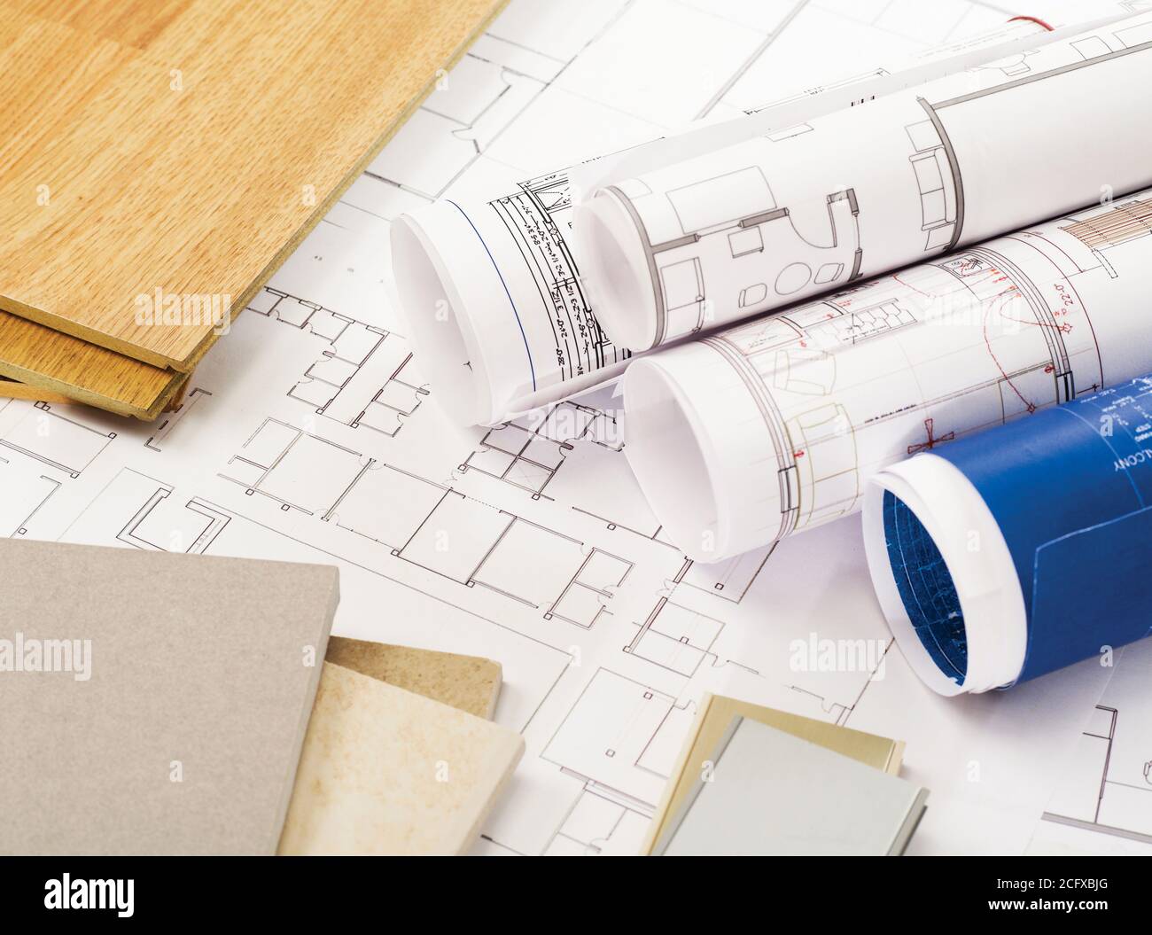 Blueprints, wood and stone samples Stock Photo - Alamy