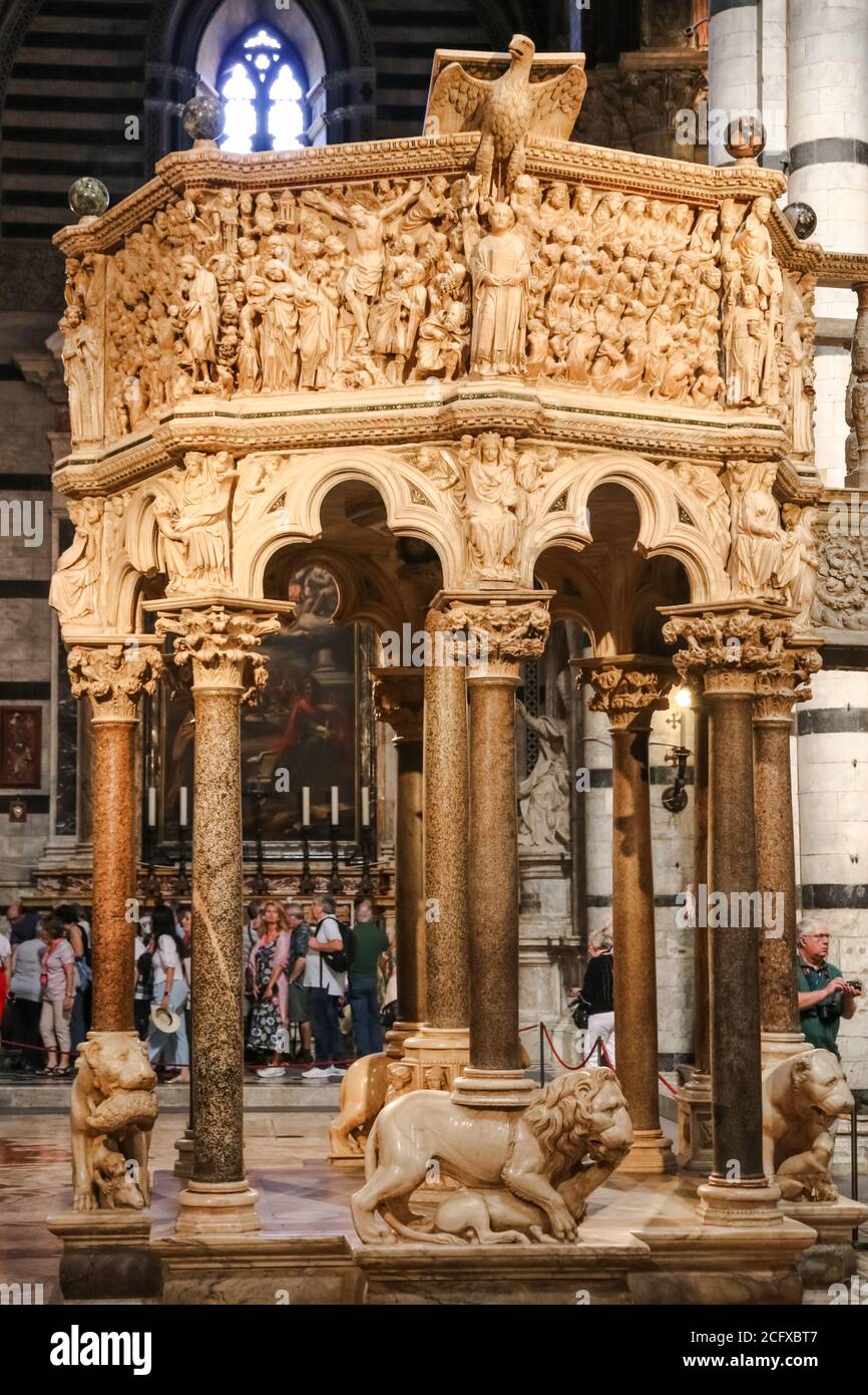 Great close-up view of the Siena Cathedral Pulpit. The octagonal structure with its seven ...