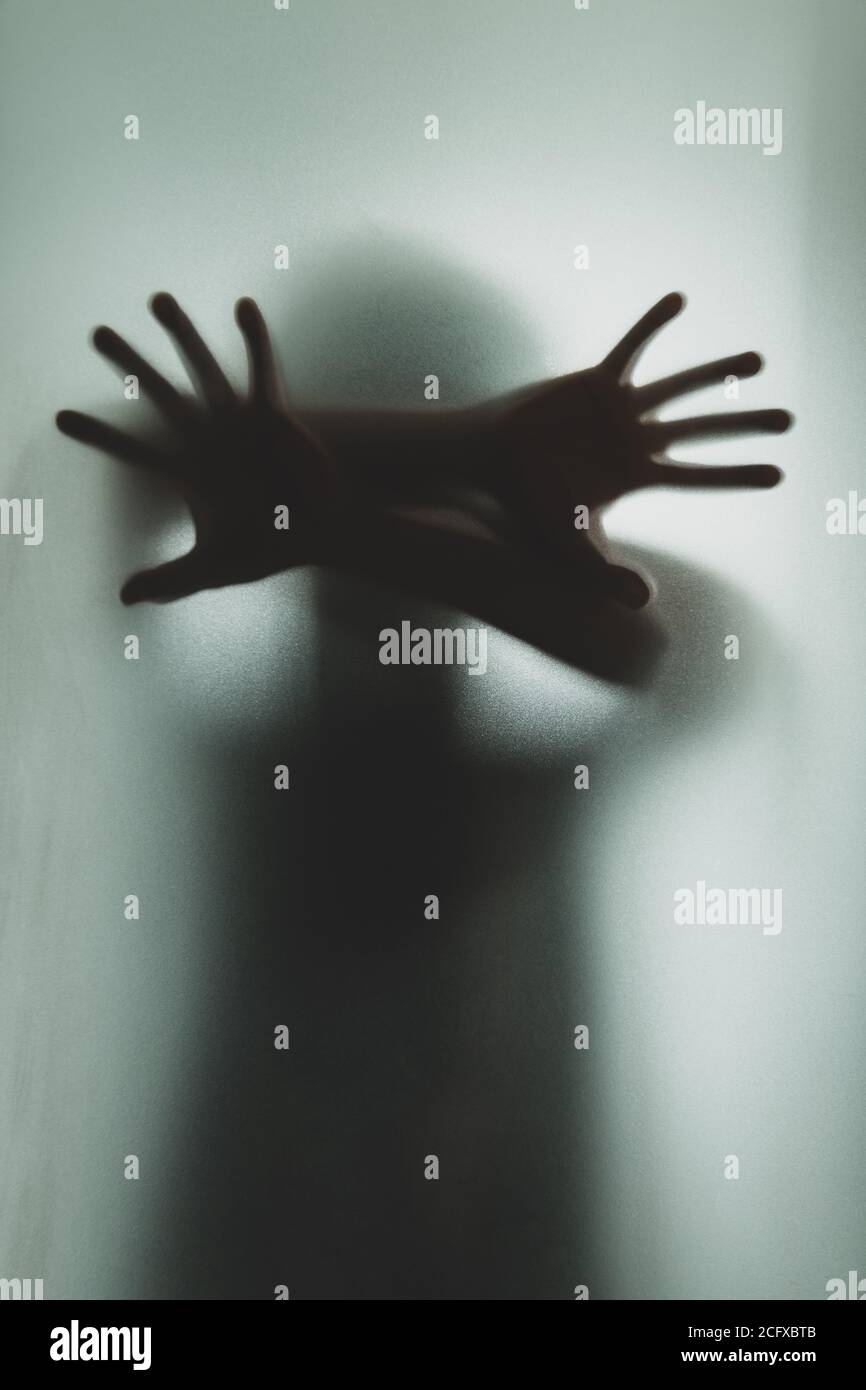 Silhouette man behind frosted glass hi-res stock photography and images ...