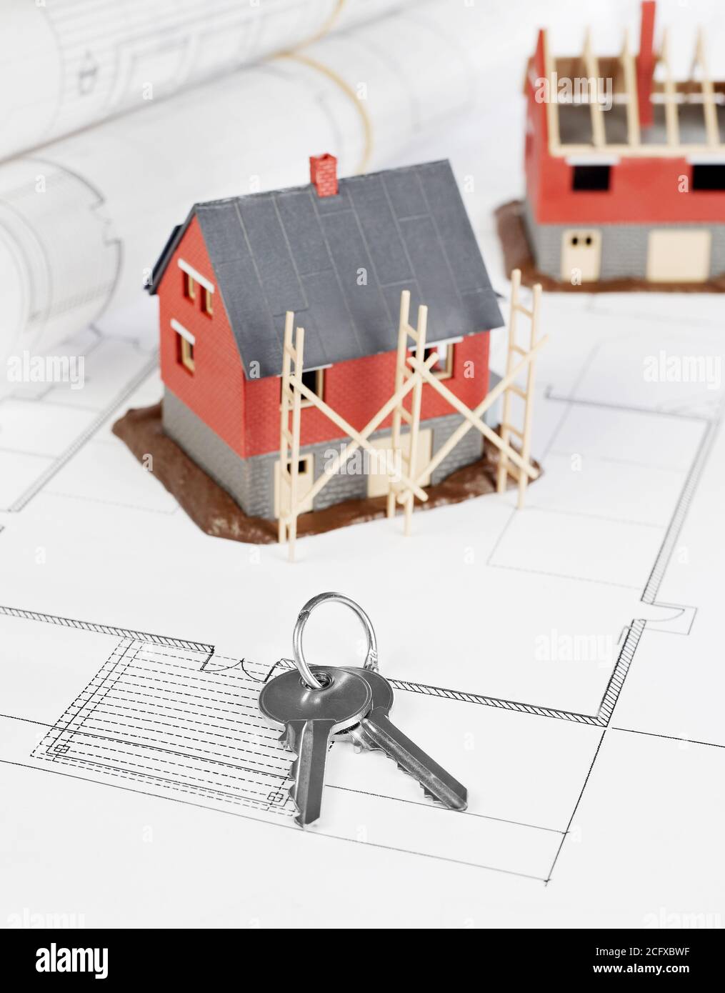 Blueprints and house structure and keys Stock Photo - Alamy