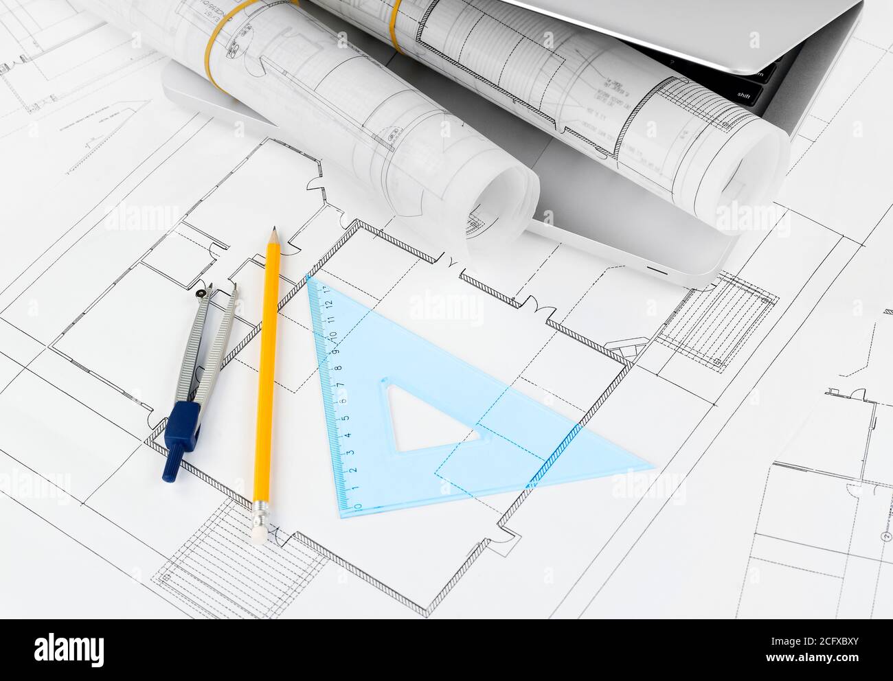 Blueprints, laptop,ruler,compas and pencil Stock Photo - Alamy