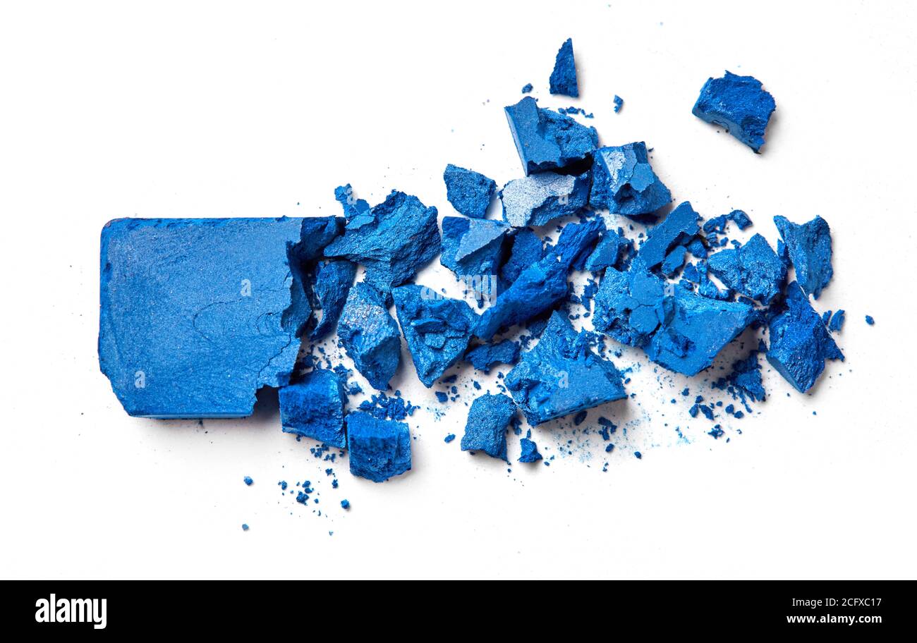 Blue make-up powders on white background Stock Photo - Alamy