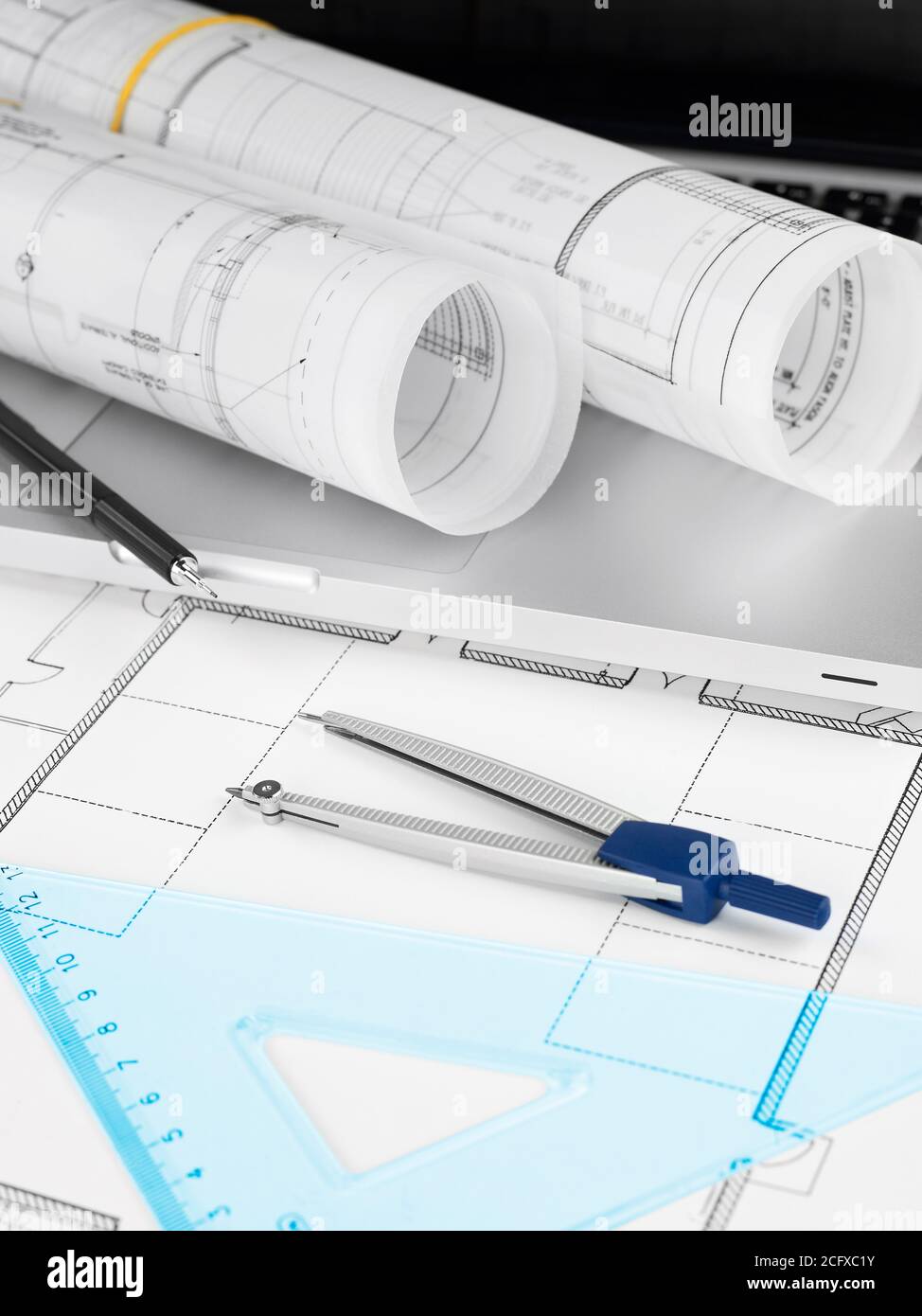 Blueprints, laptop,ruler,compas and pencil Stock Photo - Alamy
