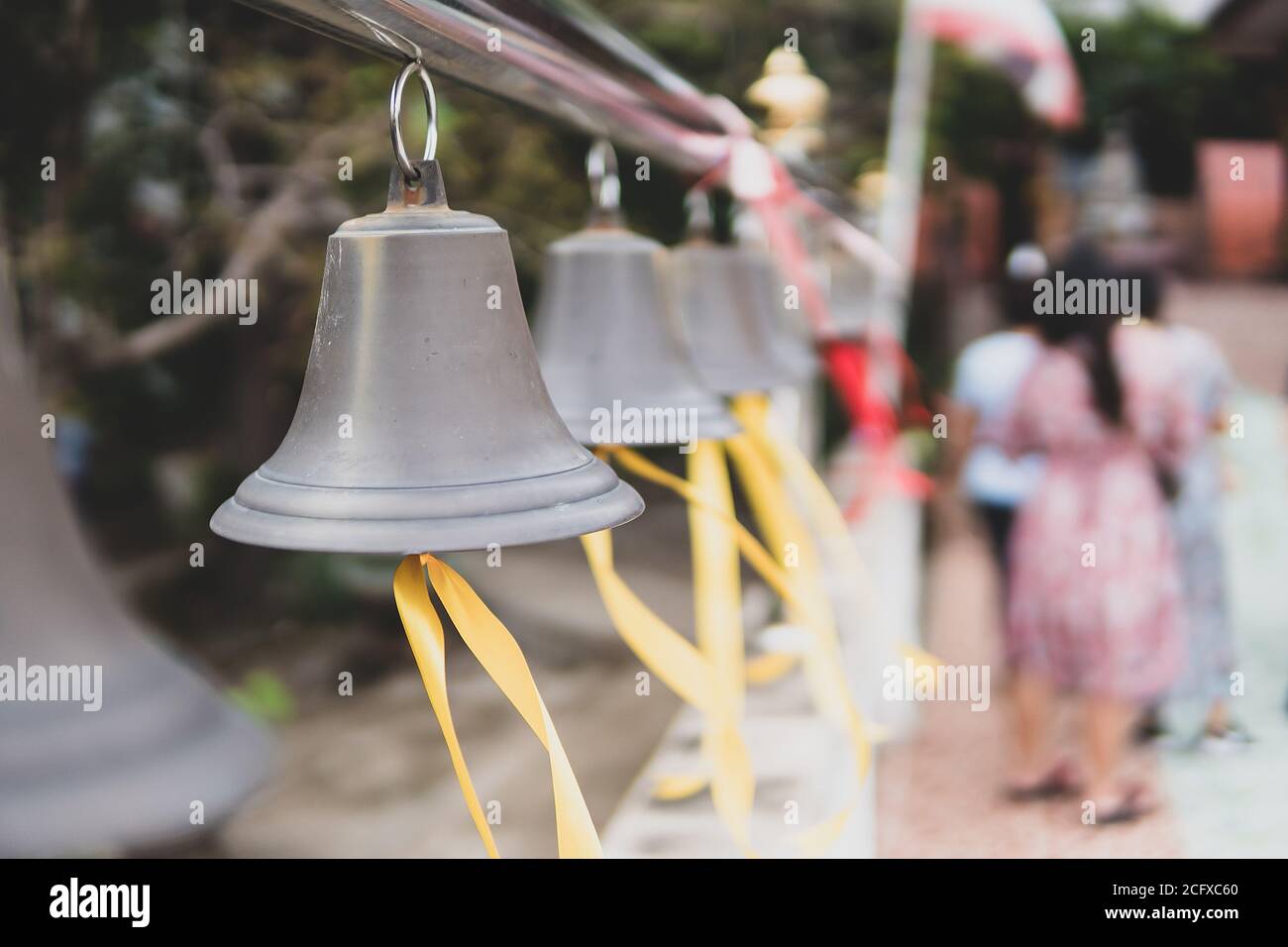 The bell in the temple hung on the pillar beside the aisle Stock Photo ...