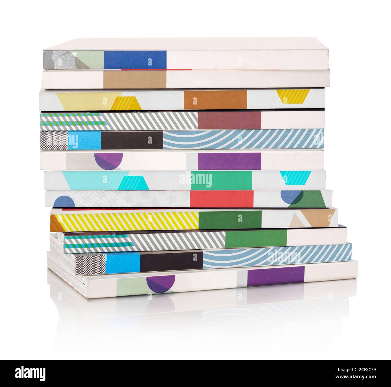 Multi-colored stack of magazines, white background Stock Photo - Alamy