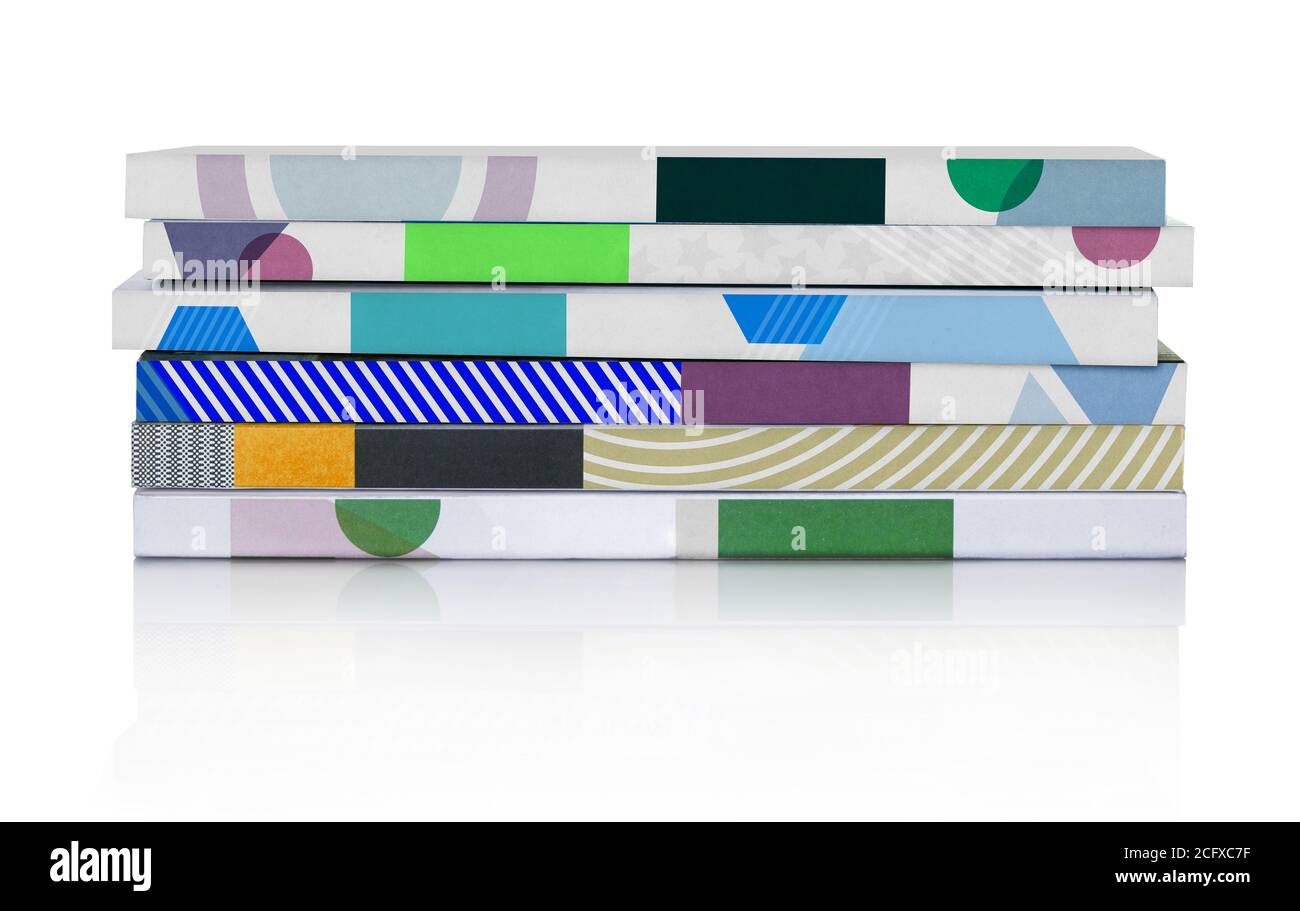 Multi-colored stack of magazines, white background Stock Photo - Alamy