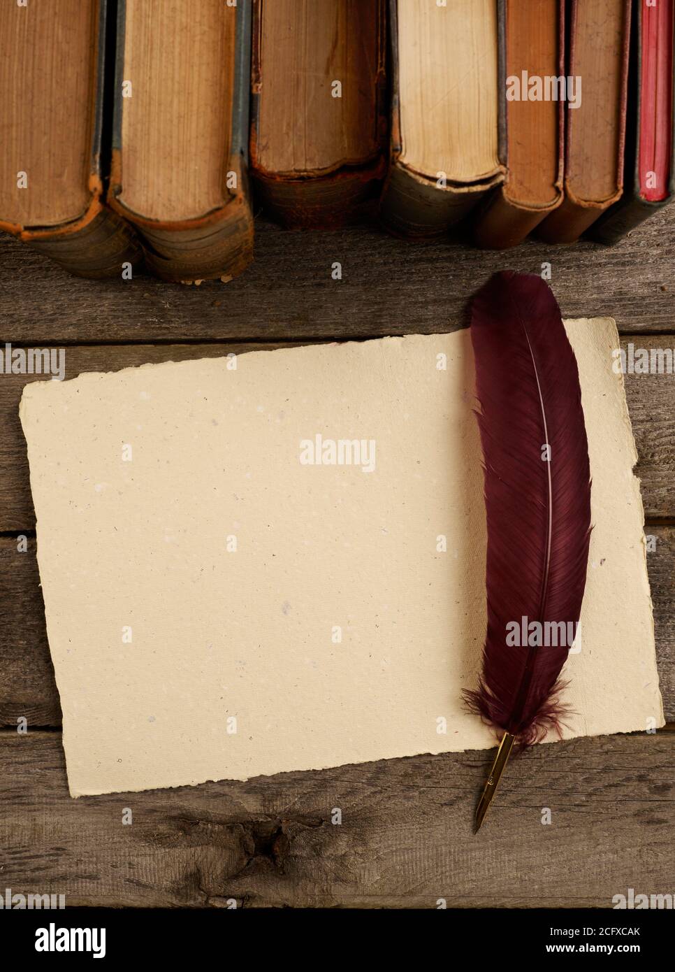 Quill pen and old paper Stock Photo - Alamy