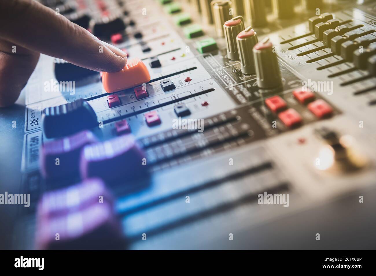 Man sound engineer hands working on sound mixer for recording Stock ...