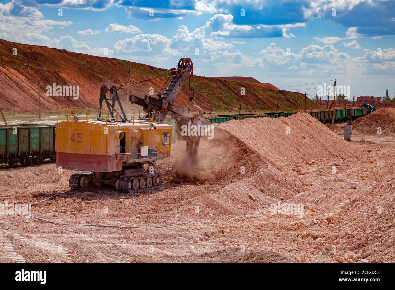 Aluminium ore mining and transporting. Bauxite clay open-cut mining ...