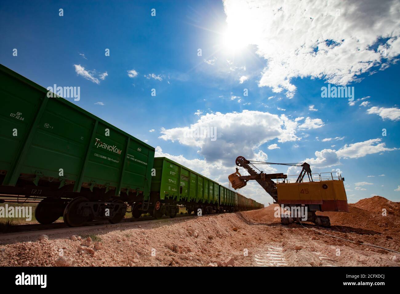 Aluminium ore mining and transporting. Bauxite clay open-cut mine ...