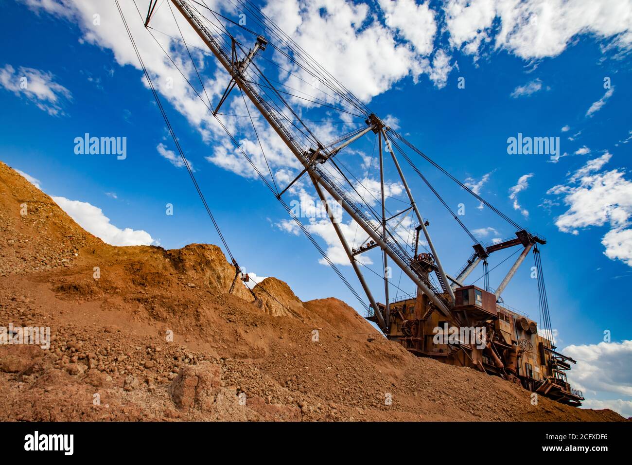 Aluminium ore mining and transporting. Open-cut mine. Walking dragline ...