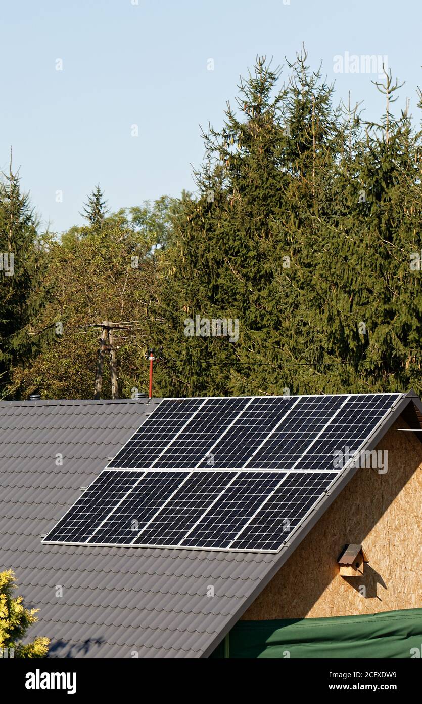 Solar power enery panel system on house roof.Renewable Energy concept ...