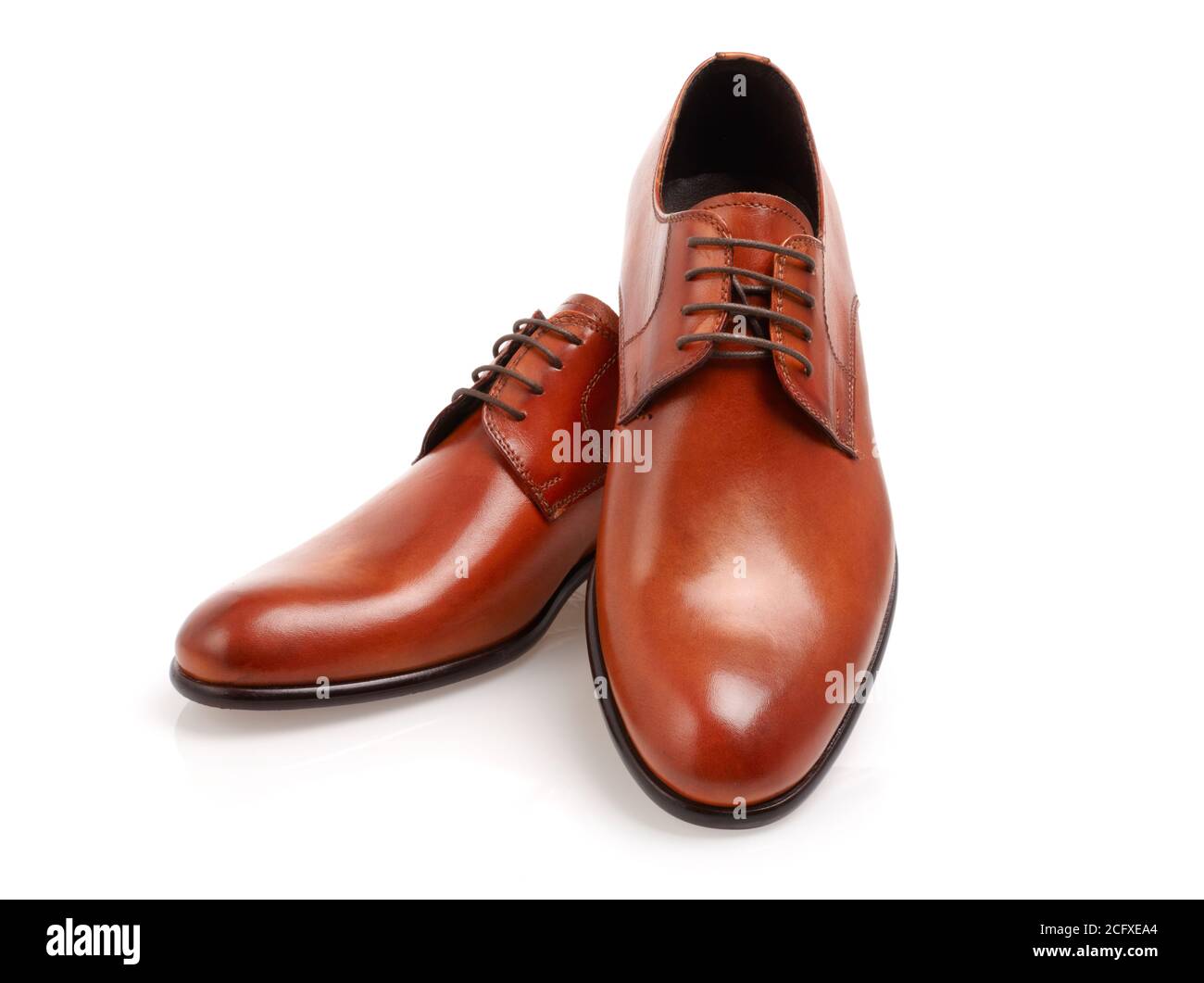 Brown shoes isolated Stock Photo - Alamy
