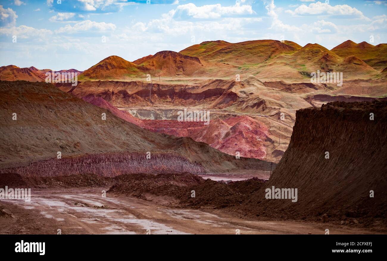 Heap of empty rocks in aluminium ore quarry. Color mine. bauxite open ...