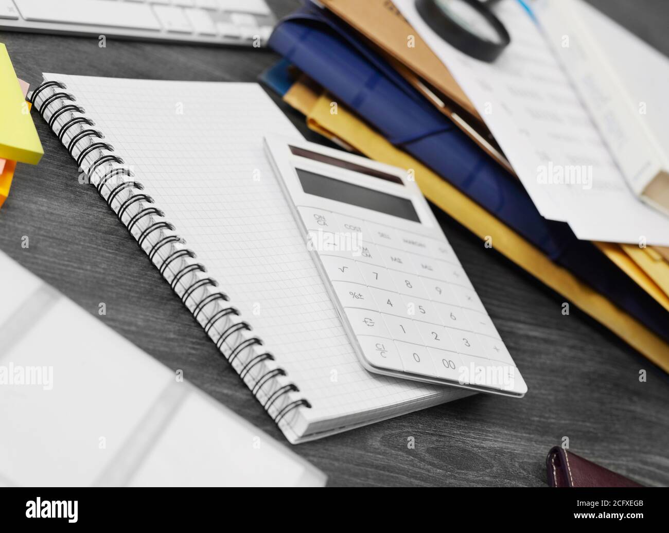 Calculator on desk Stock Photo - Alamy