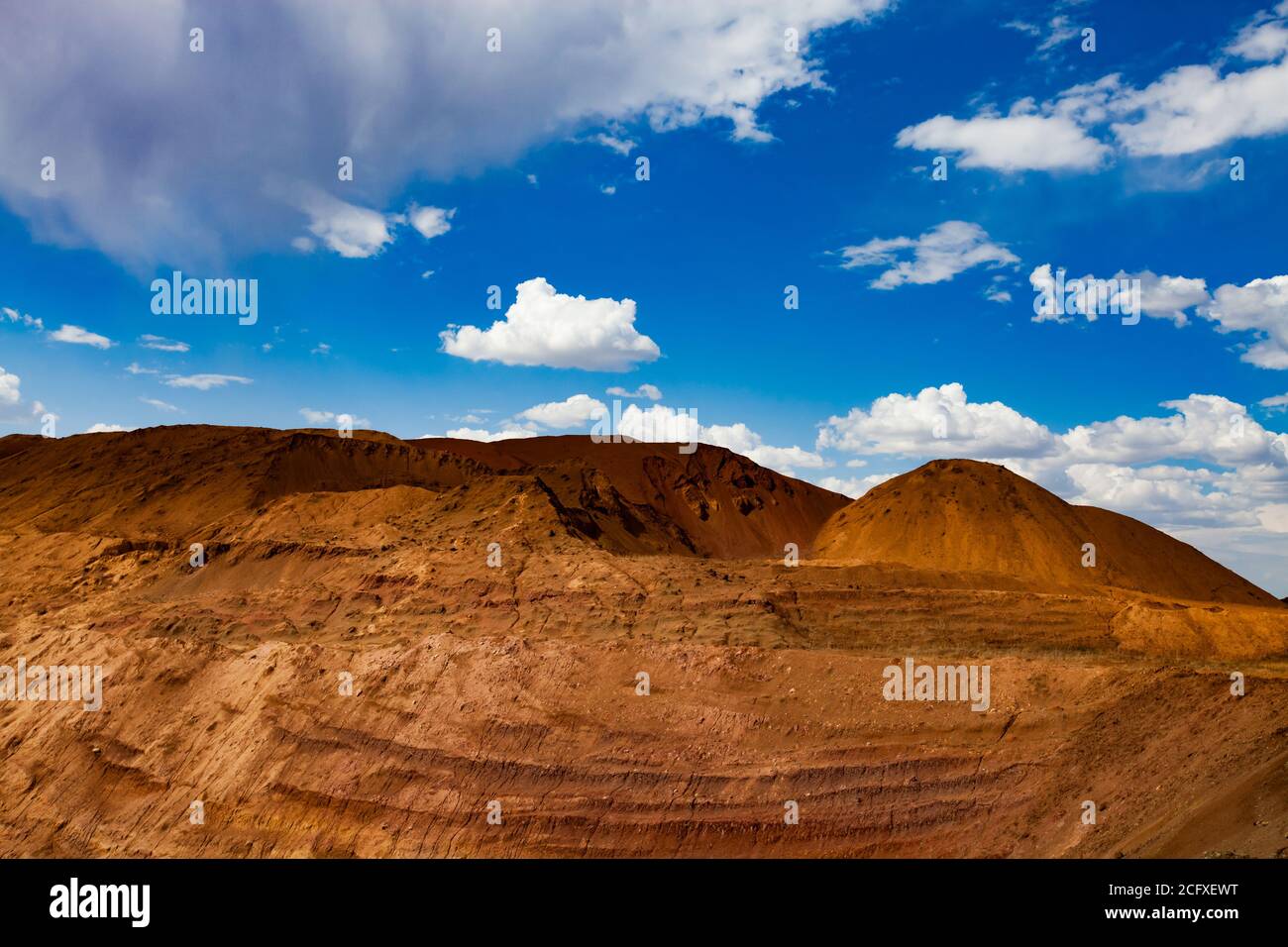 Bauxite open cast (open cut) mining. Color aluminium ore quarry. Big ...