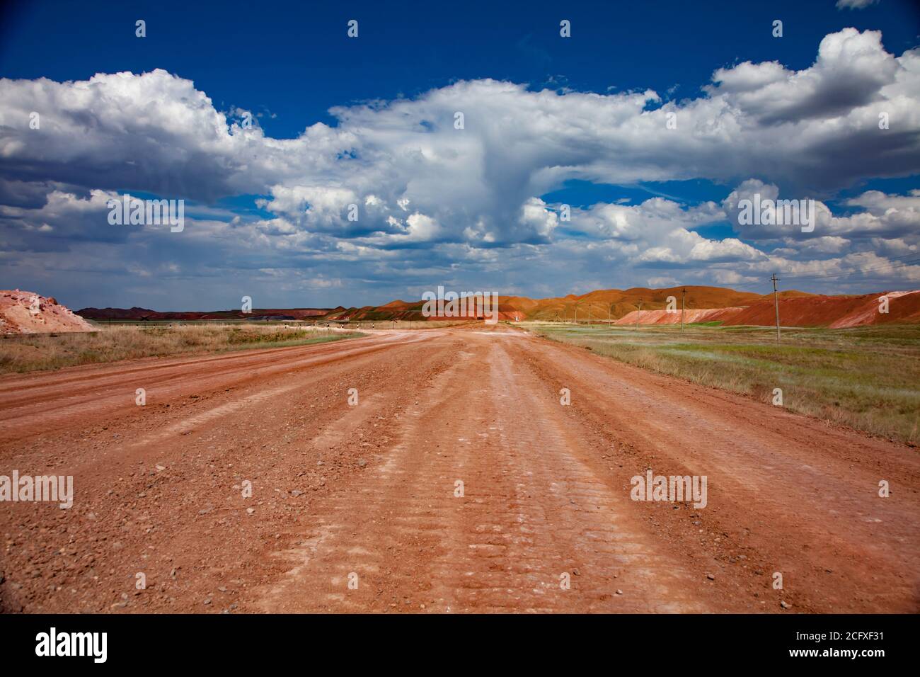 Colorful landscape of bauxite mine (aluminium ore quarry). Orange soil ...