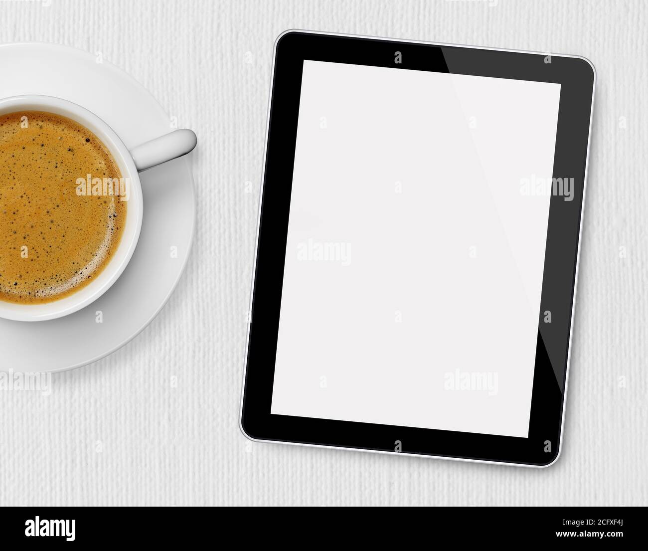 Tablet and coffee cup Stock Photo - Alamy