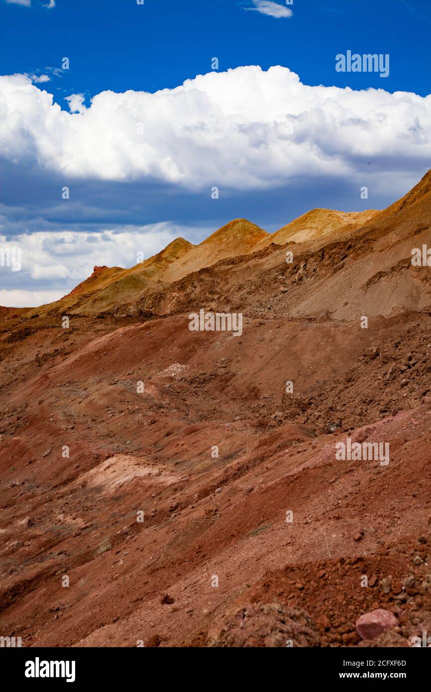 Aluminium ore quarry. Bauxite clay open-cut mining. Heaps of empty ...
