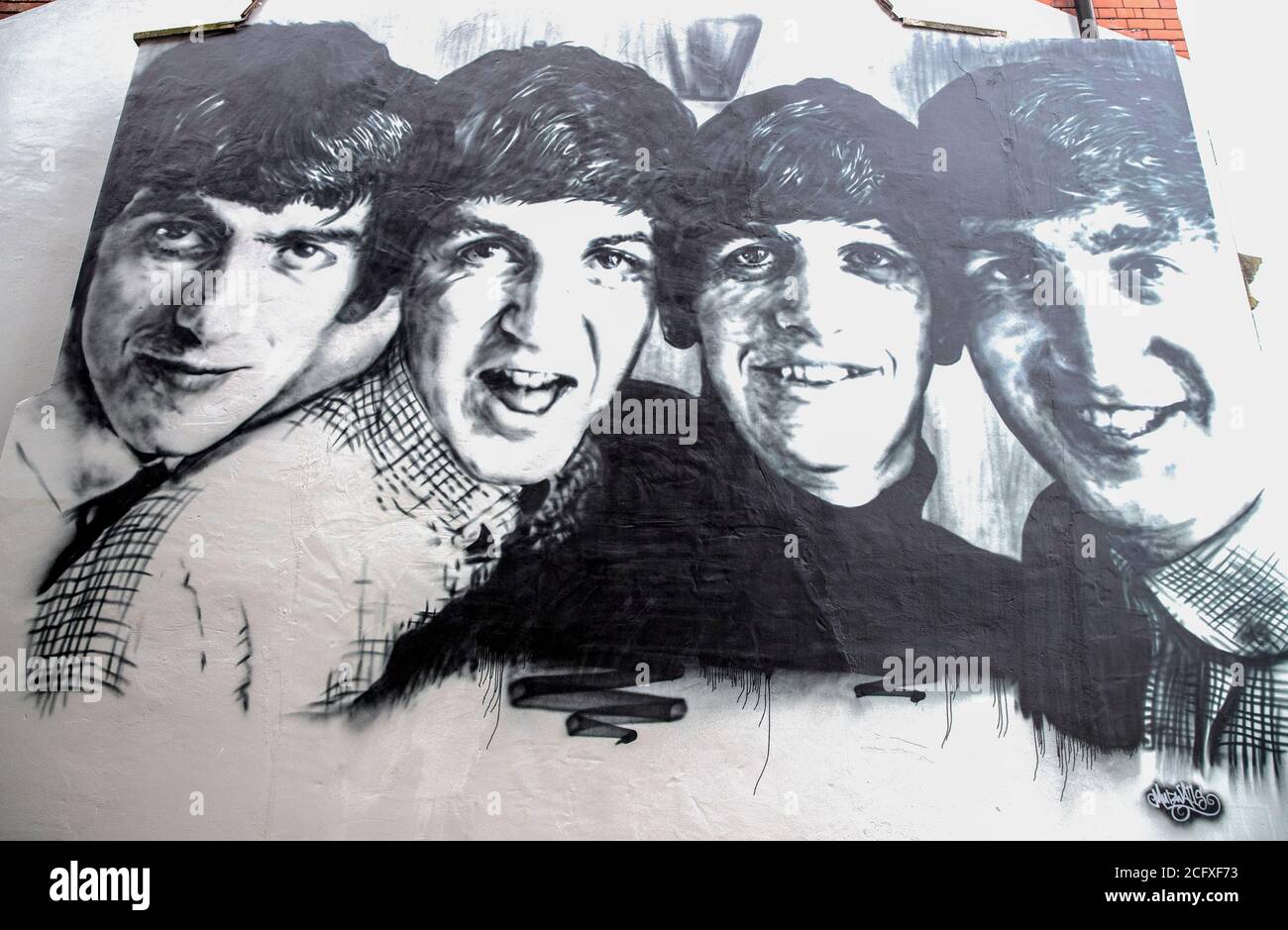 A new Beatles mural that has appeared on the gable end of The Pheonix ...