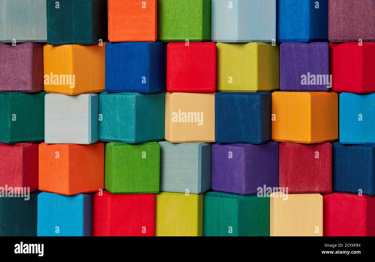 Wooden toy blocks background Stock Photo - Alamy