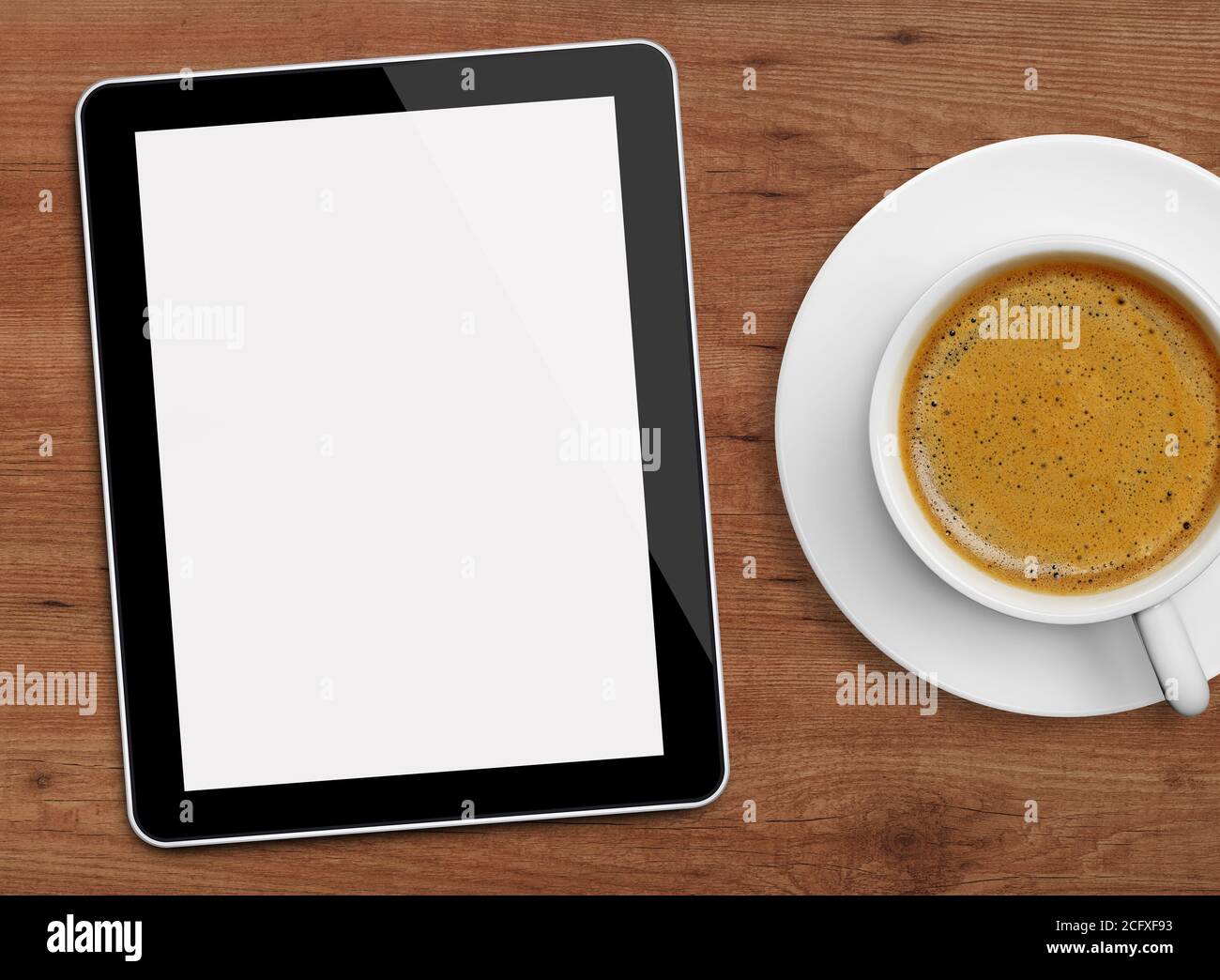 Tablet and coffee cup Stock Photo - Alamy