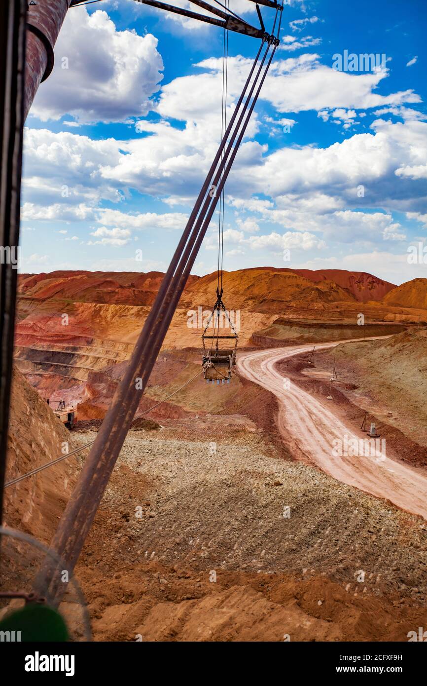 Bauxite clay open-cut mining. Aluminium ore quarry. Walking dragline ...