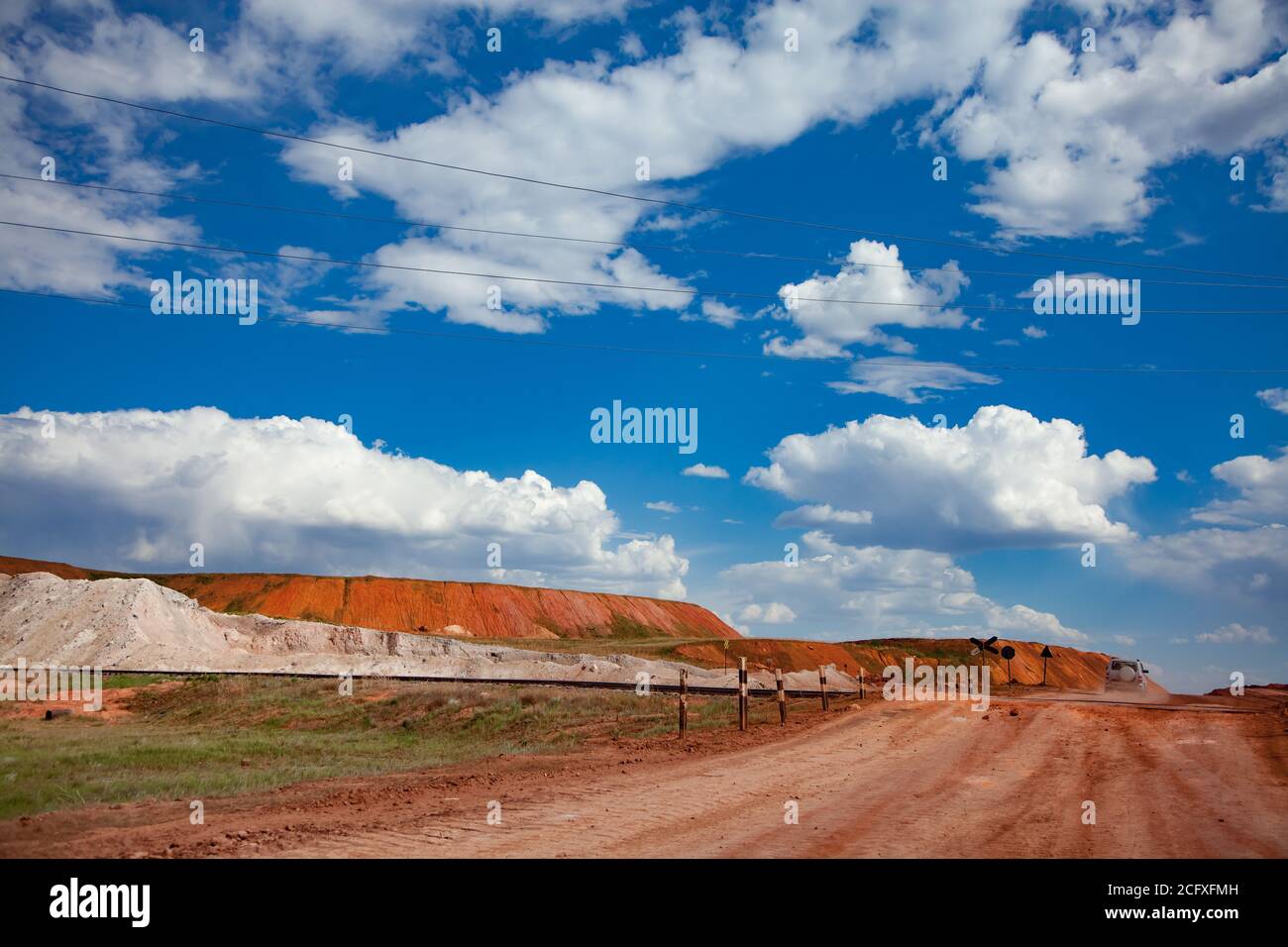 Aluminium ore quarry. Bauxite clay open-cut mining. Heap of color ...
