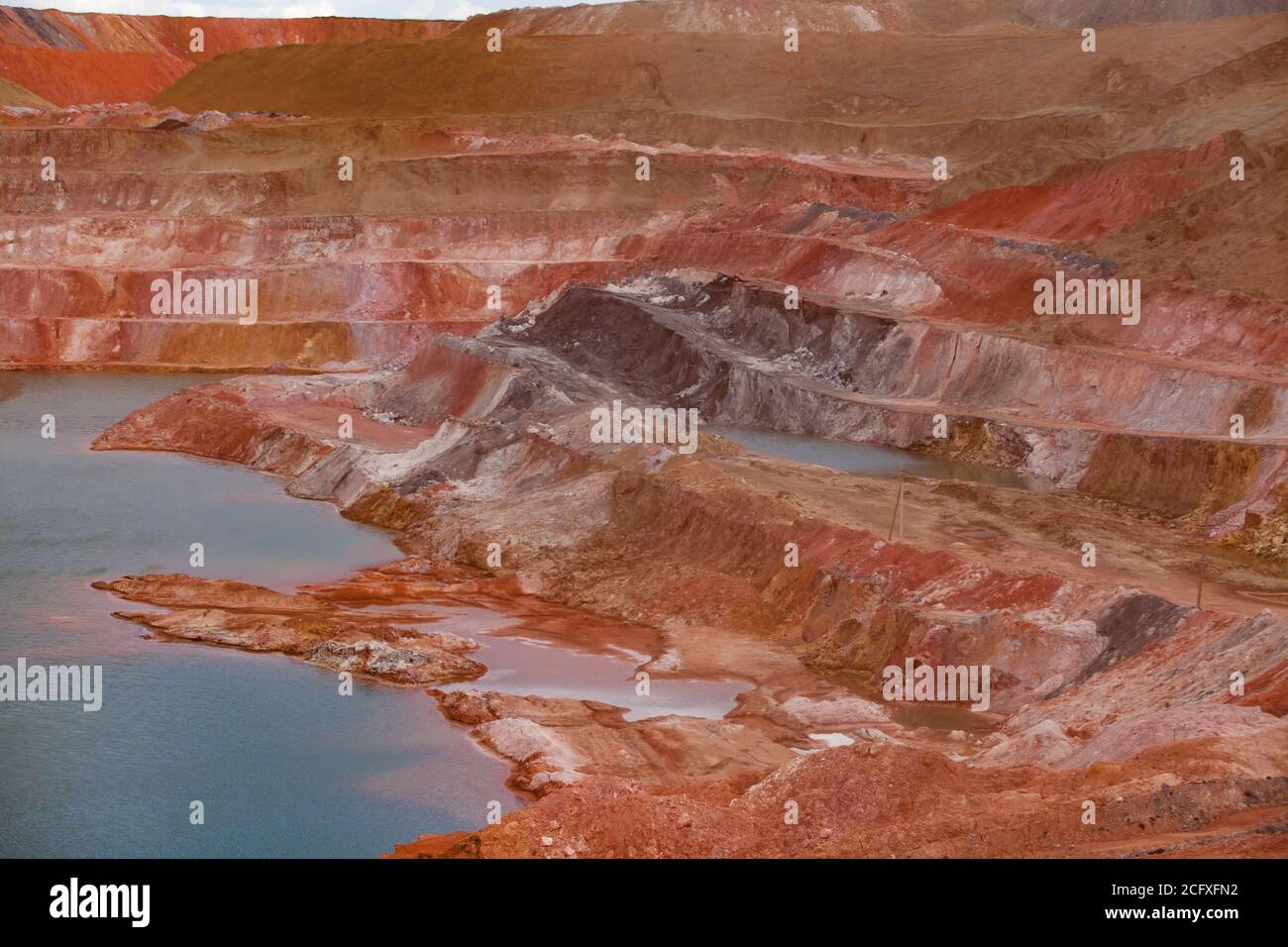 Aluminium ore quarry. Bauxite red clay open-cut mining. Quarry steps of ...