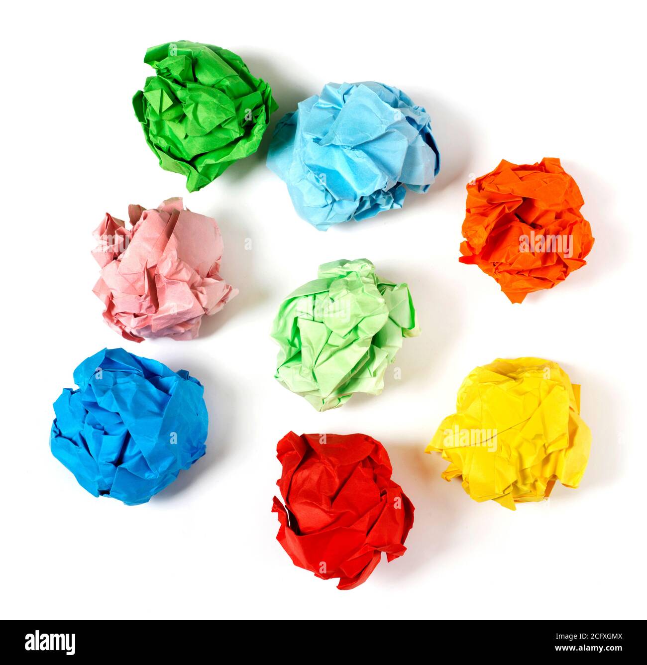 Multi-colored paper balls on white background Stock Photo - Alamy