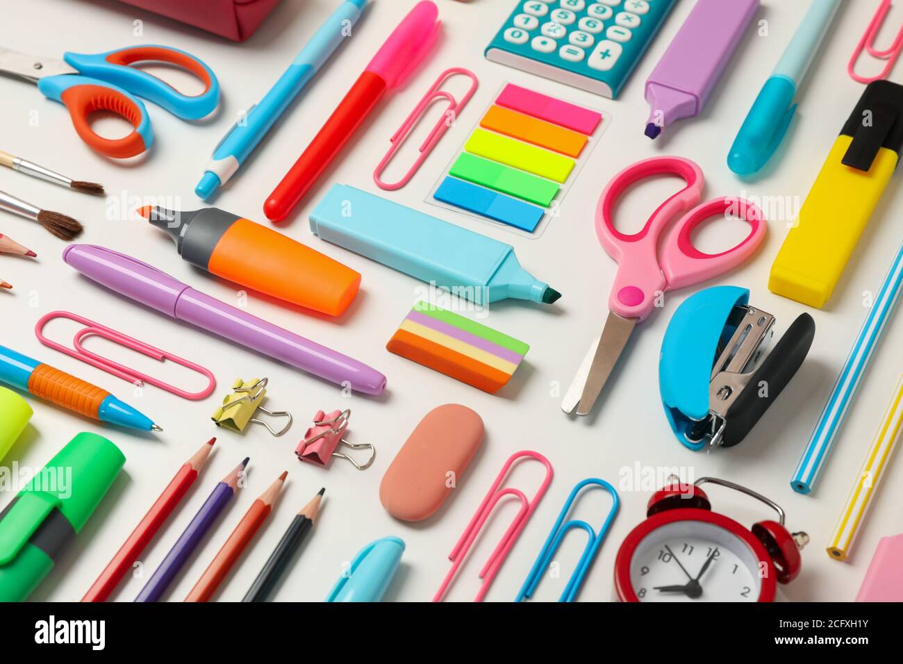 Flat lay with different school supplies on white background Stock Photo ...