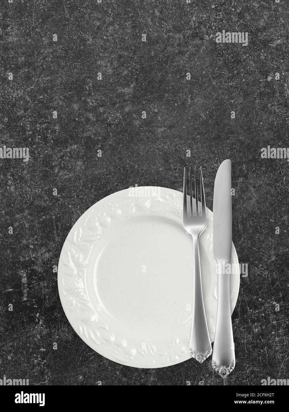 Dinner plate with copy space Stock Photo - Alamy