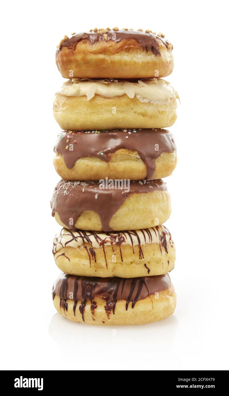 Stack chocolate donuts on pink Cut Out Stock Images & Pictures - Alamy