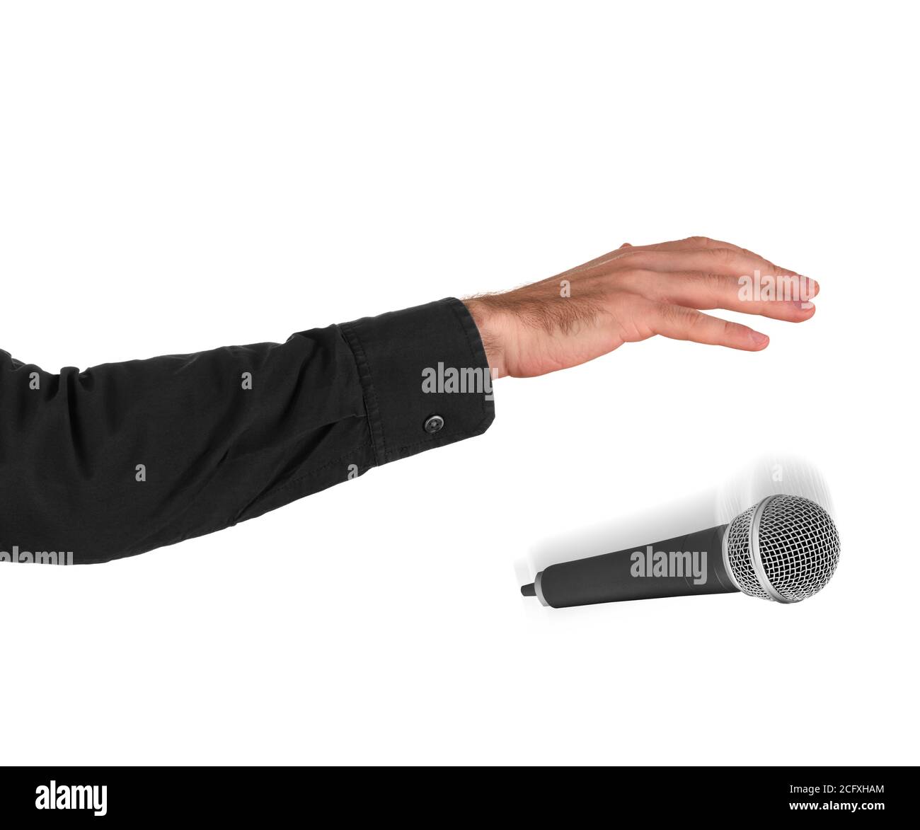 Man hand dropping the microphone Stock Photo - Alamy