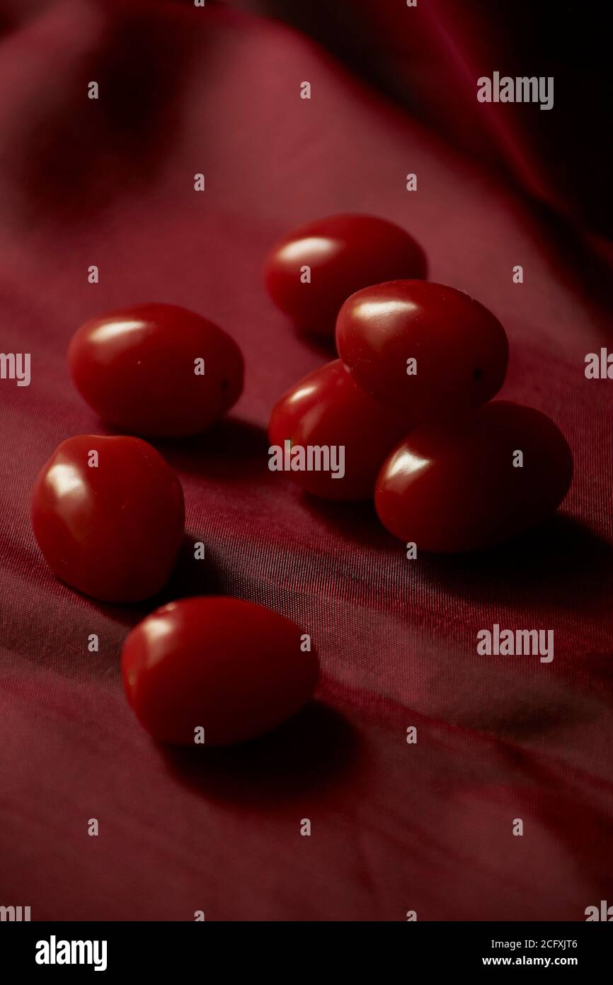 Monochrome red still life ideas Stock Photo - Alamy