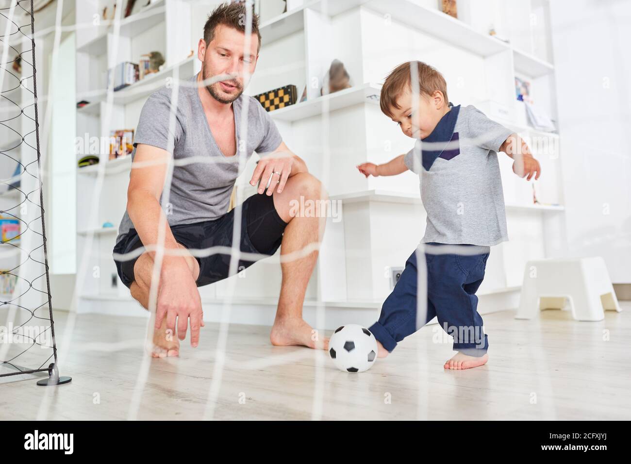 Child scoring goal soccer hi-res stock photography and images - Alamy