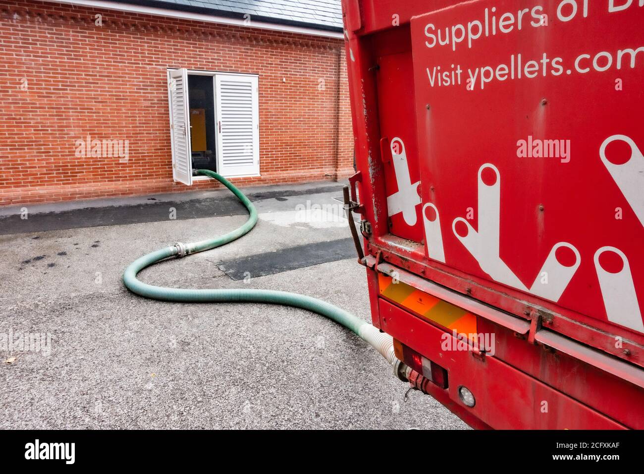 Lorry bulk delivering wood pellets for biomass heating system Stock ...