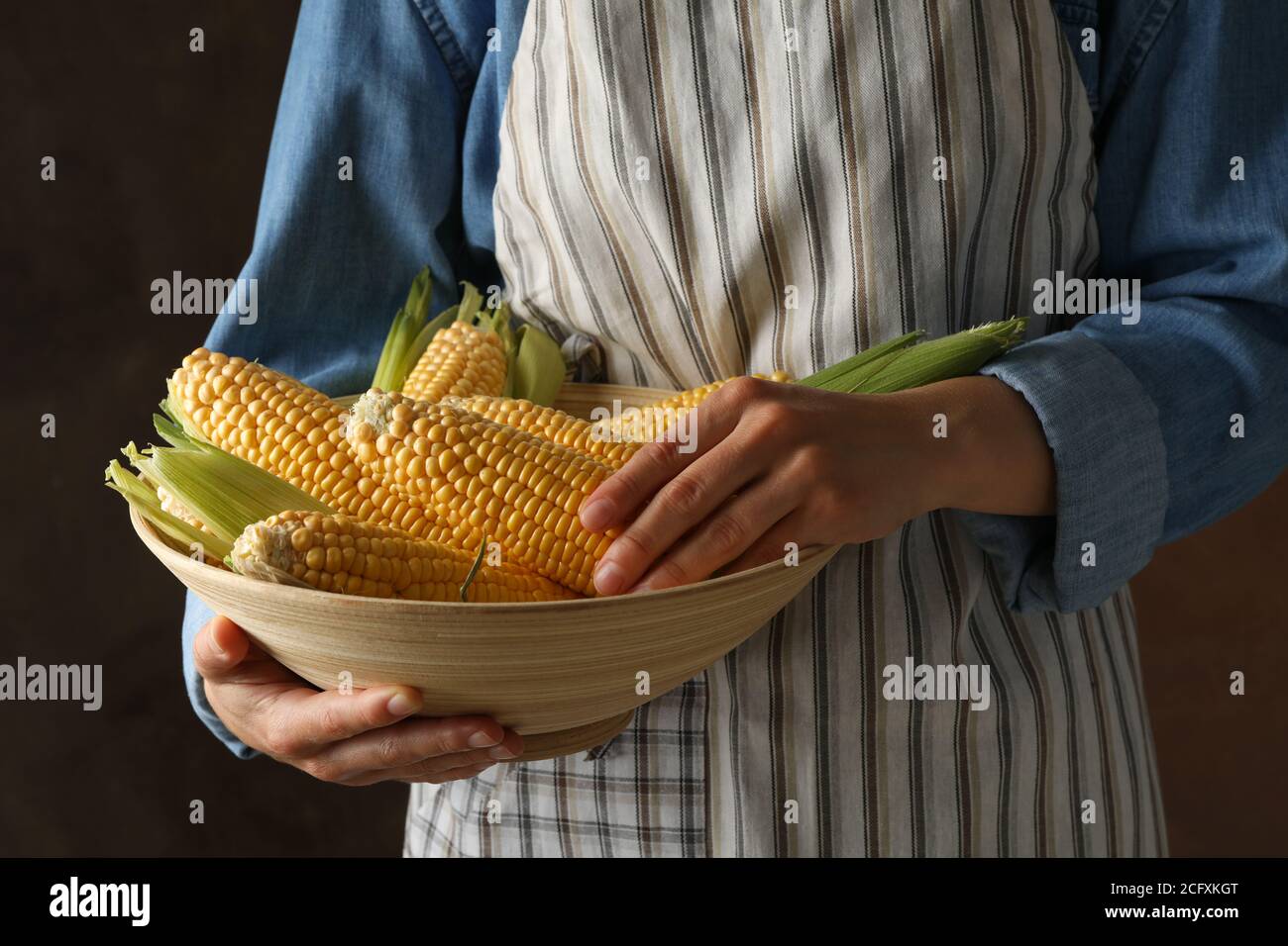 Woman fresh corn against hi-res stock photography and images - Alamy